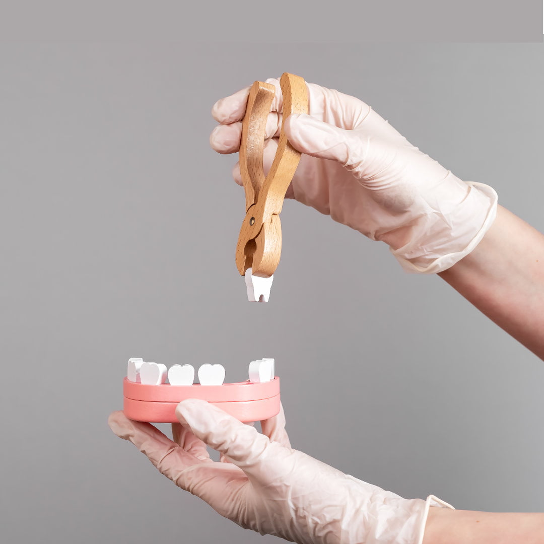 Tooth Extraction by Top Pediatric Dentist, Surat l Little Dent